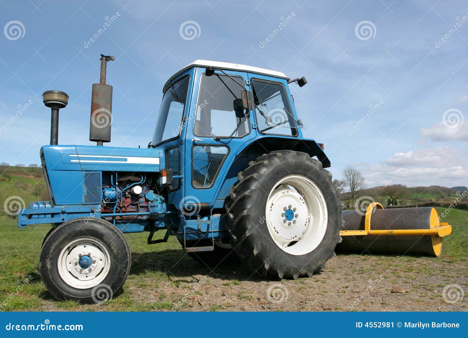 Tractor and Roller stock image. Image of tractors, industry - 4552981