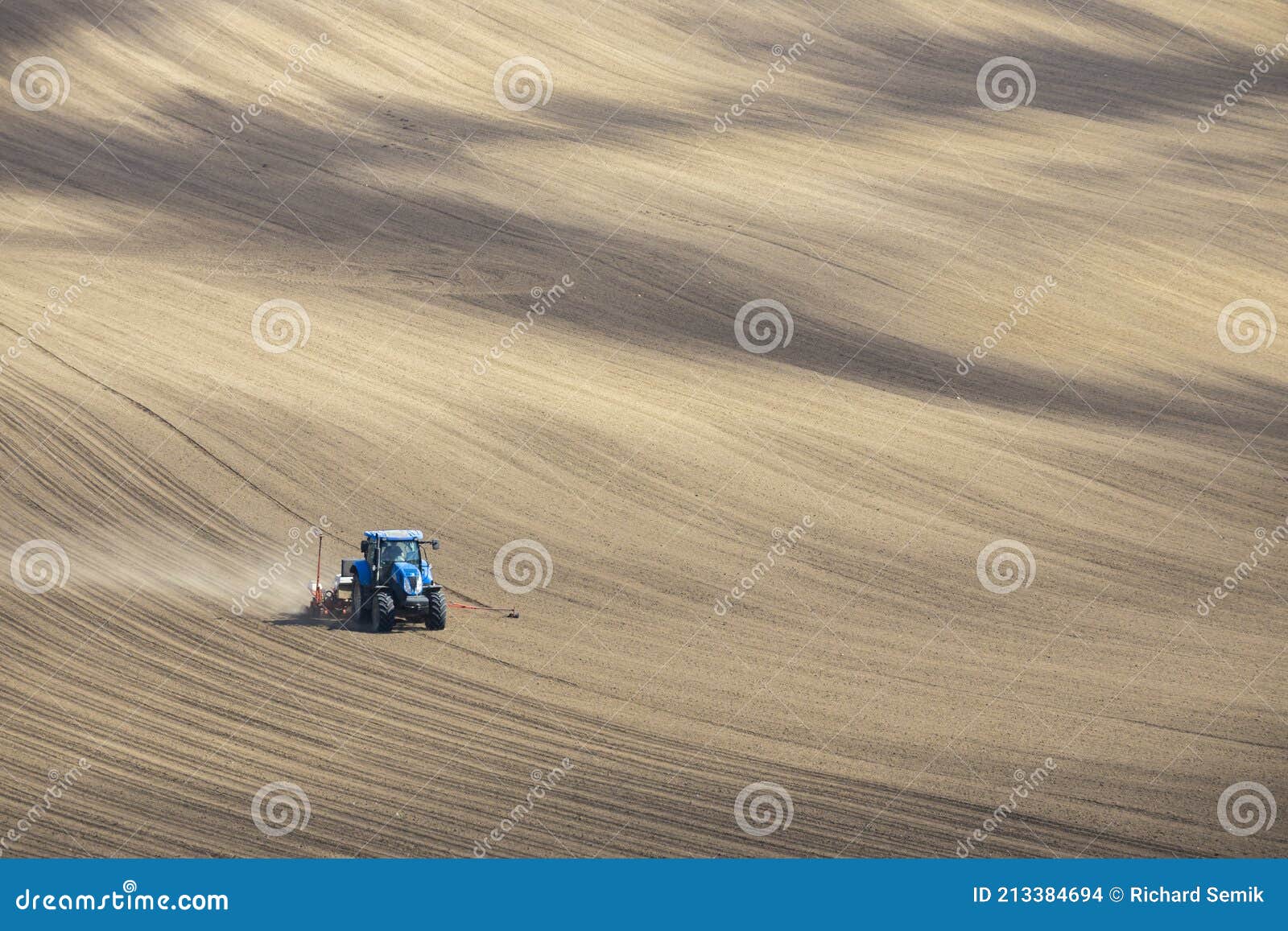 Tractor with Seed Drill in Early Spring Landscape Stock Photo - Image ...