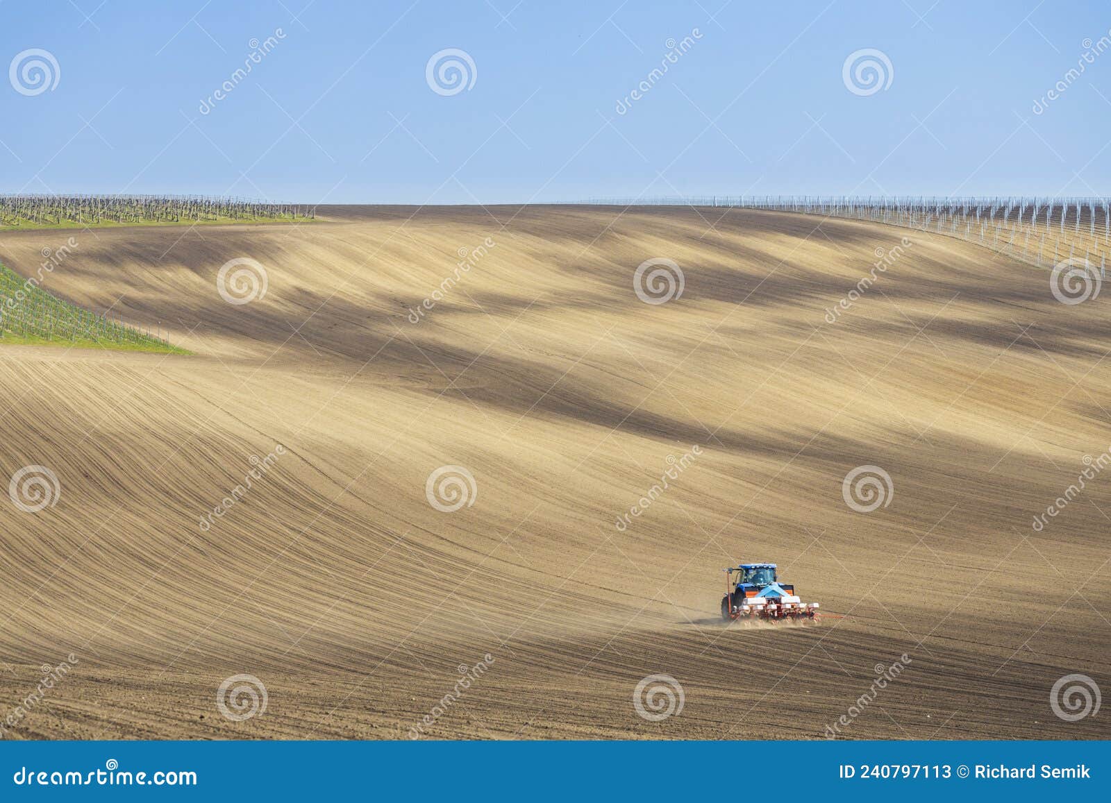 Tractor with Seed Drill in Early Spring Landscape Stock Image - Image ...