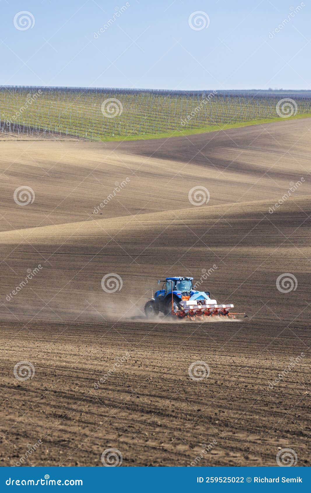 Tractor with Seed Drill in Early Spring Landscape Stock Photo - Image ...
