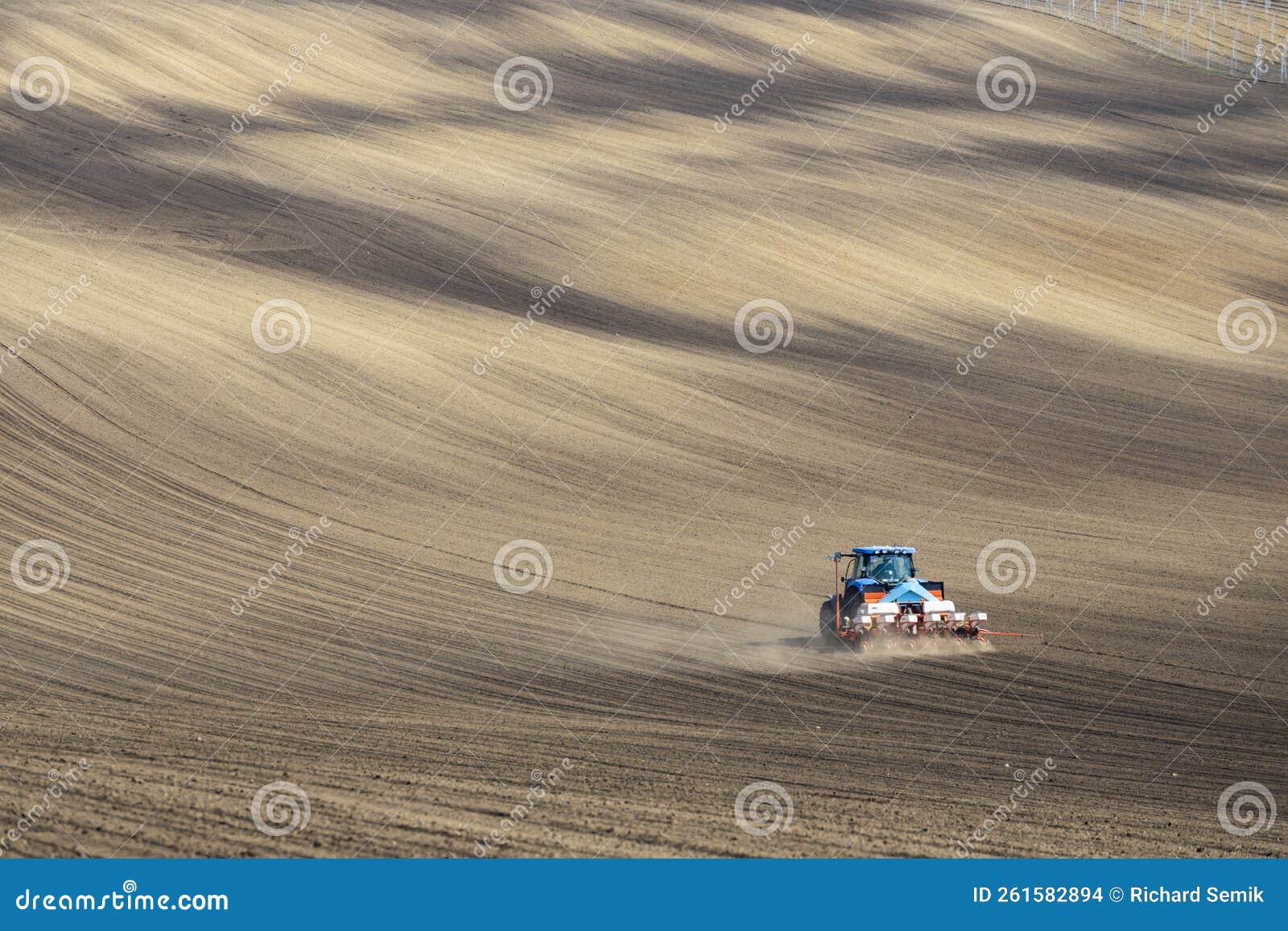 Tractor with Seed Drill in Early Spring Landscape Stock Photo - Image ...