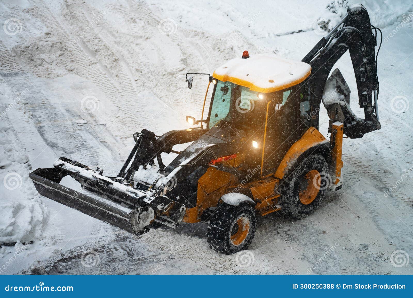 Tractor shoveling snow stock photo. Image of plow, safety - 300250388