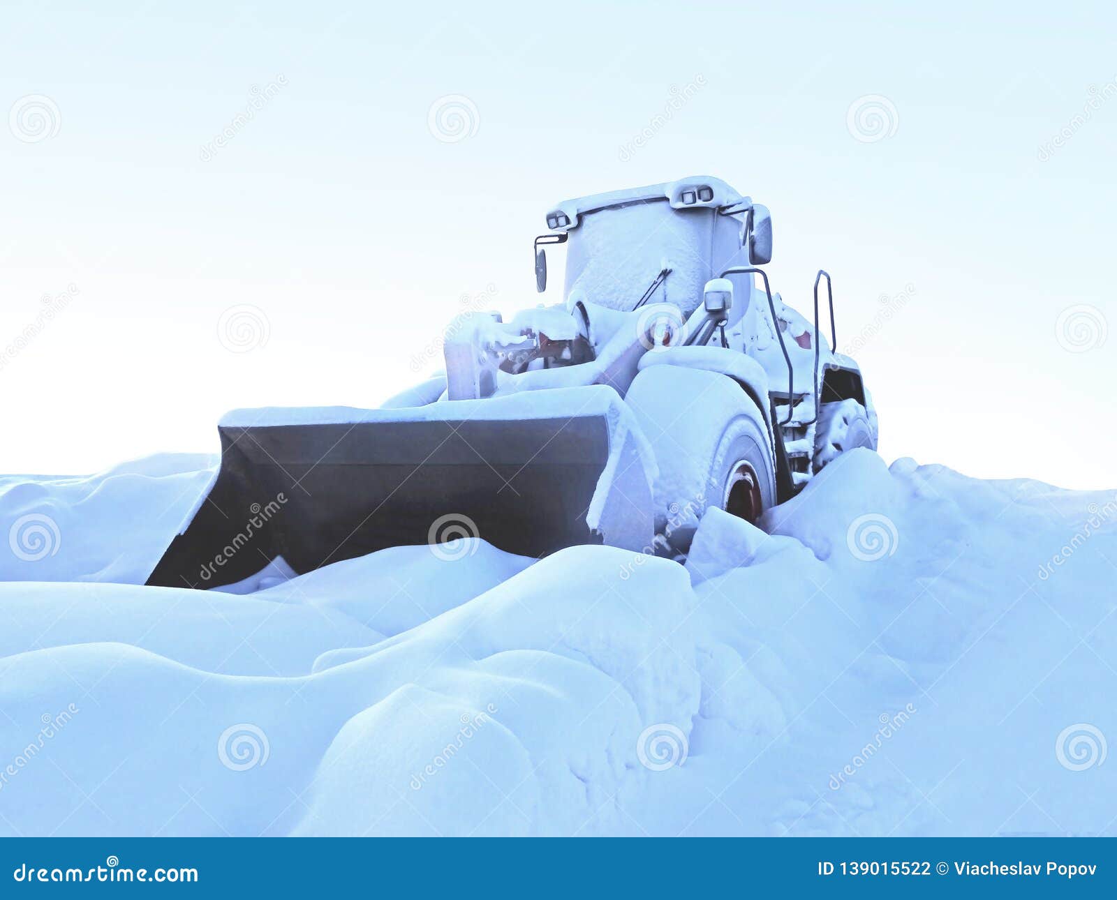 Tractor in the snow stock photo. Image of weather, buried - 139015522