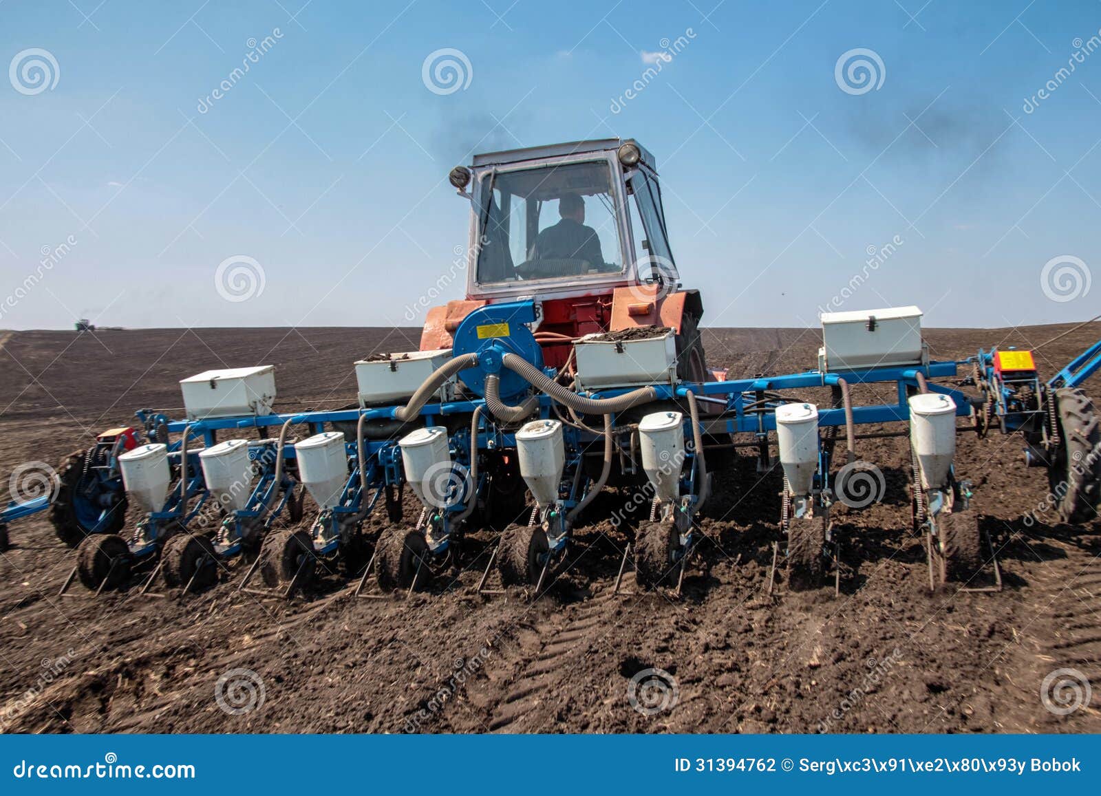 Tractor with Sower on the Field Stock Photo - Image of outdoors ...