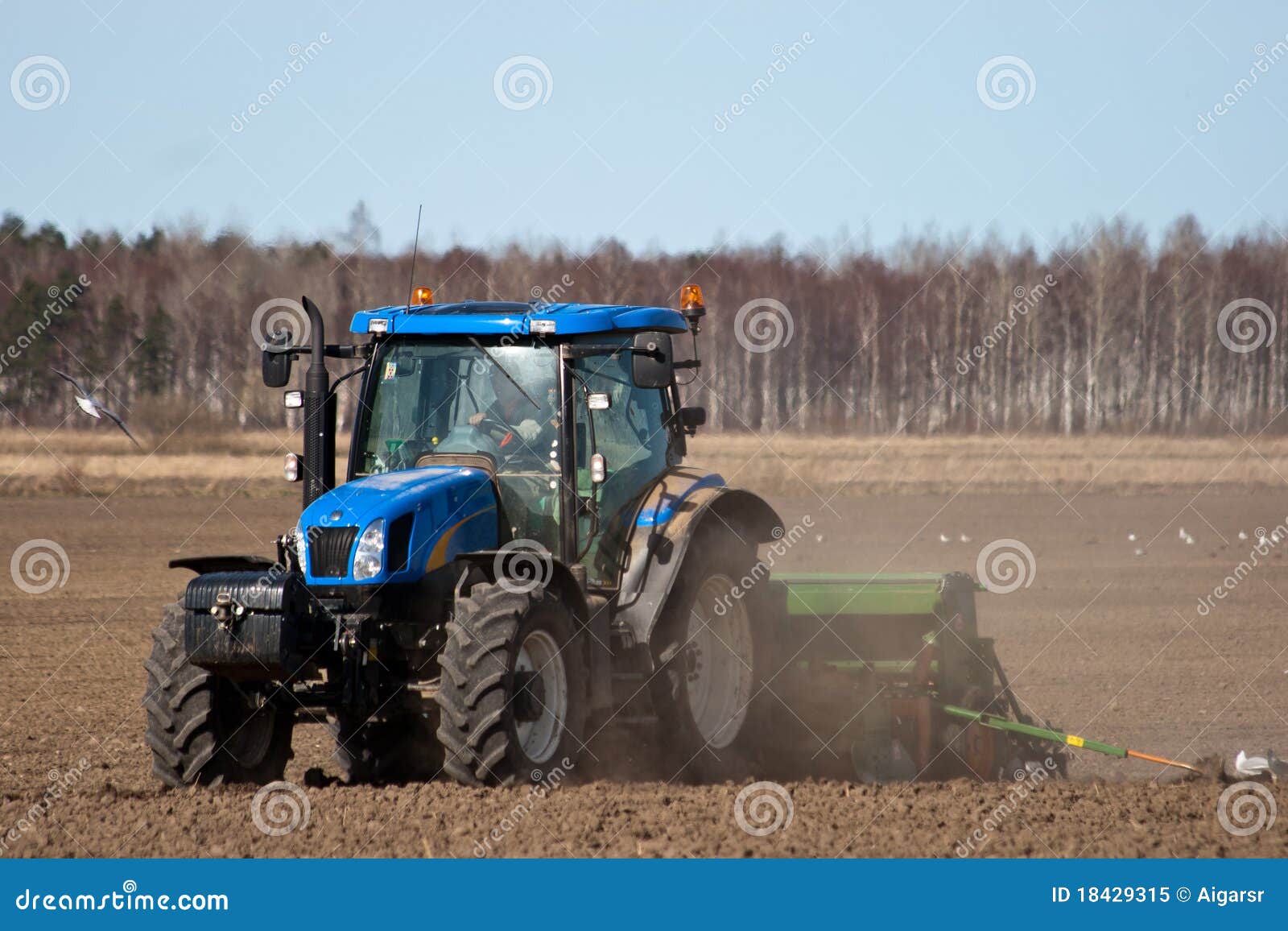 Tractor sowing seed stock image. Image of ploughing, farmer - 18429315