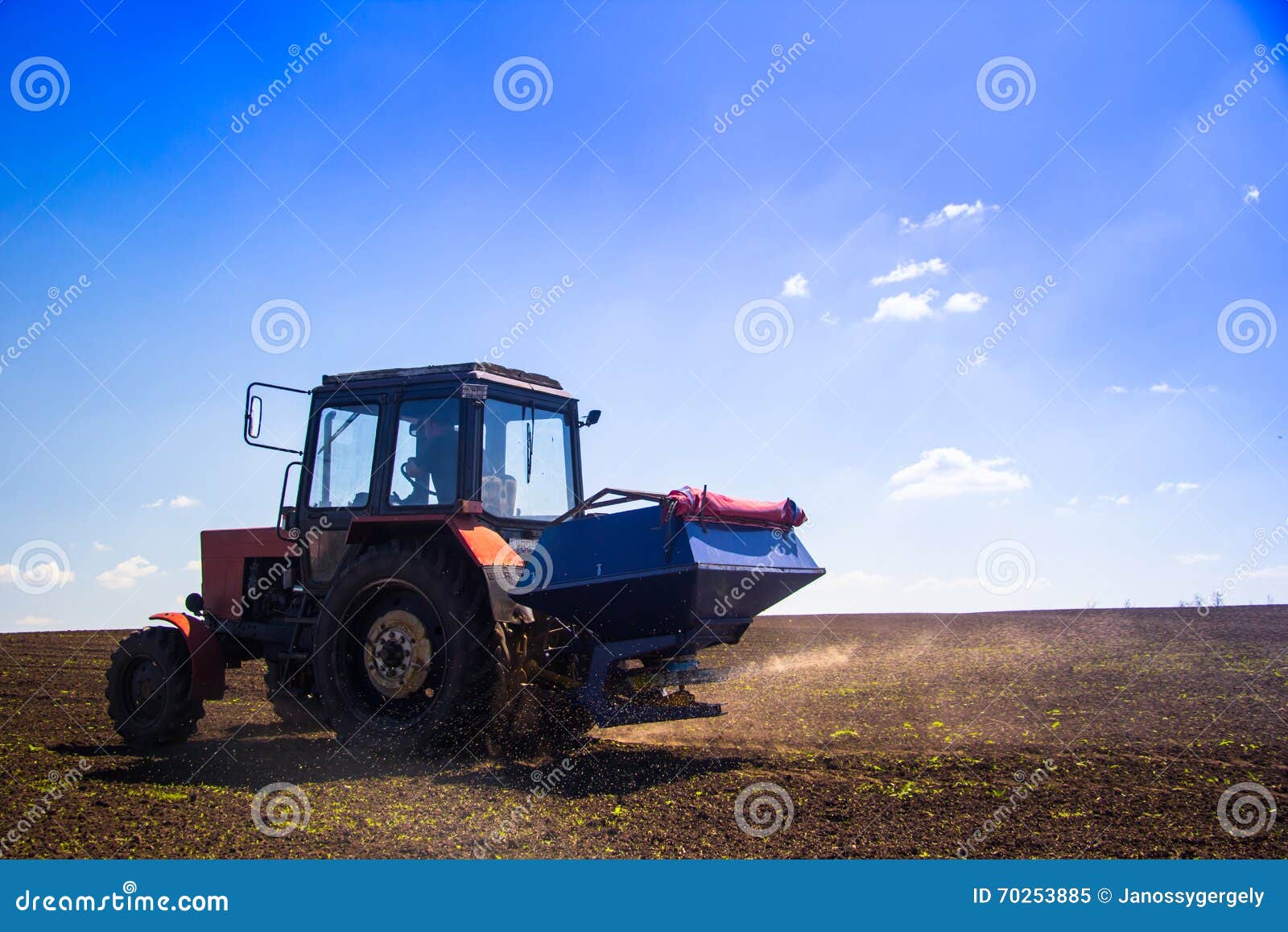 Tractor Spaying a Field in the Spring Editorial Image - Image of ...