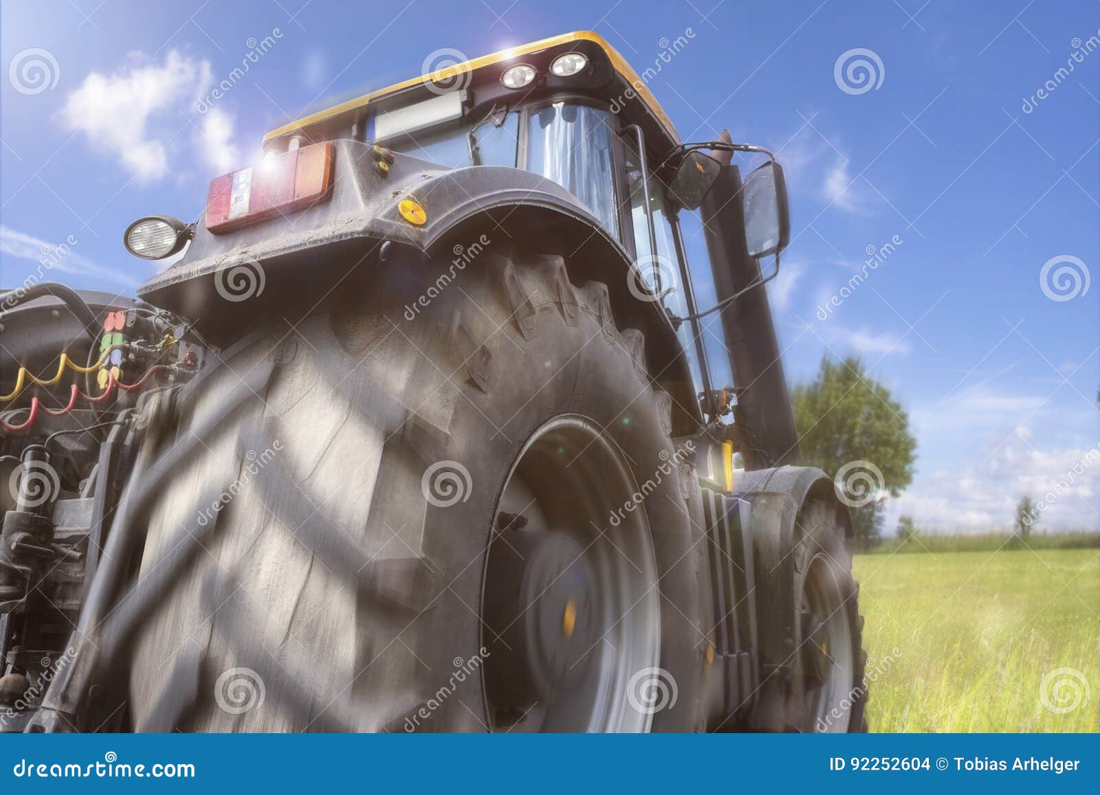 Tractor Speeding on a Meadow Stock Photo - Image of farmland, soil ...