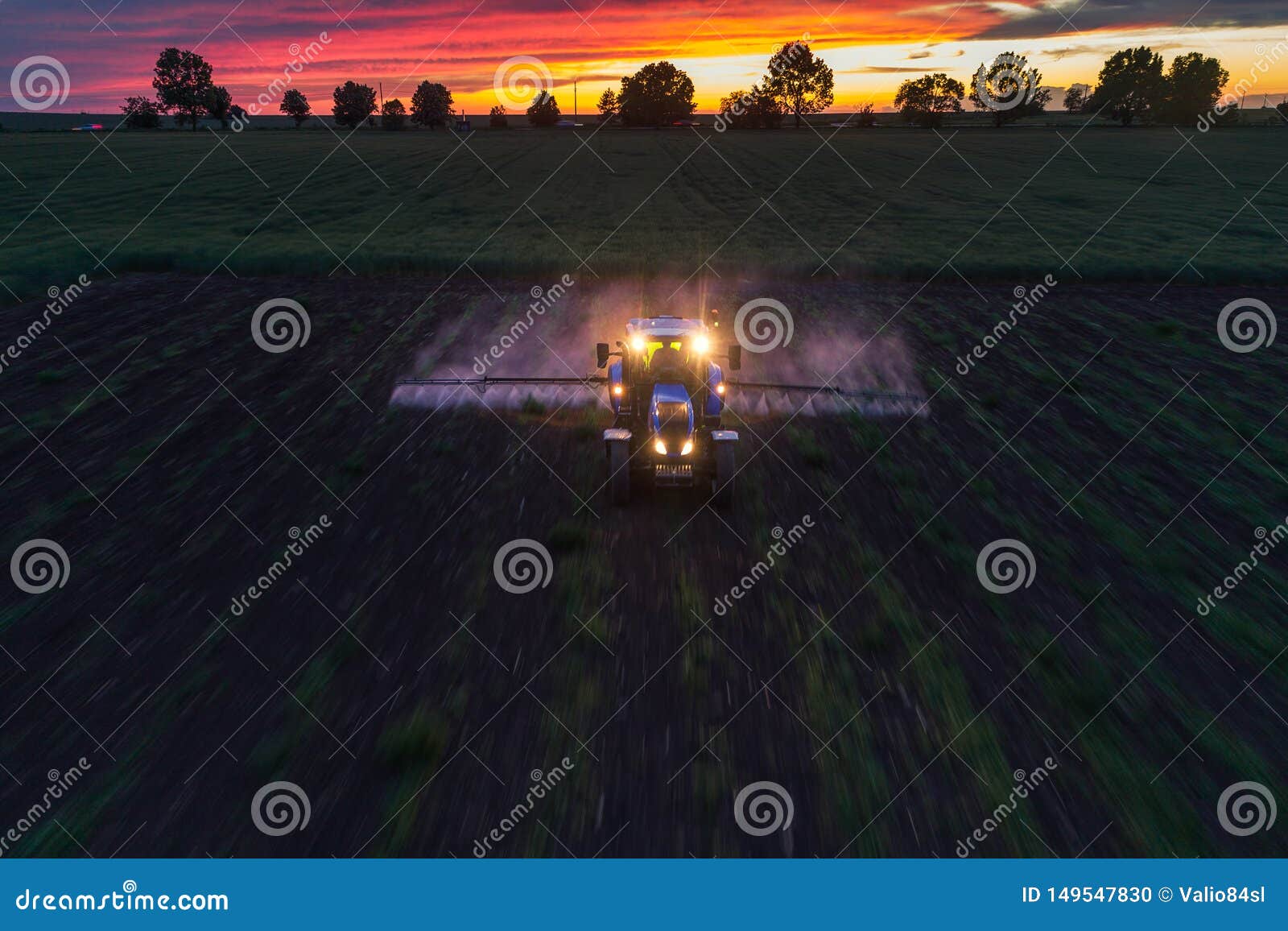 Tractor Spraying Field at Spring,aerial Sunset View Stock Photo - Image ...