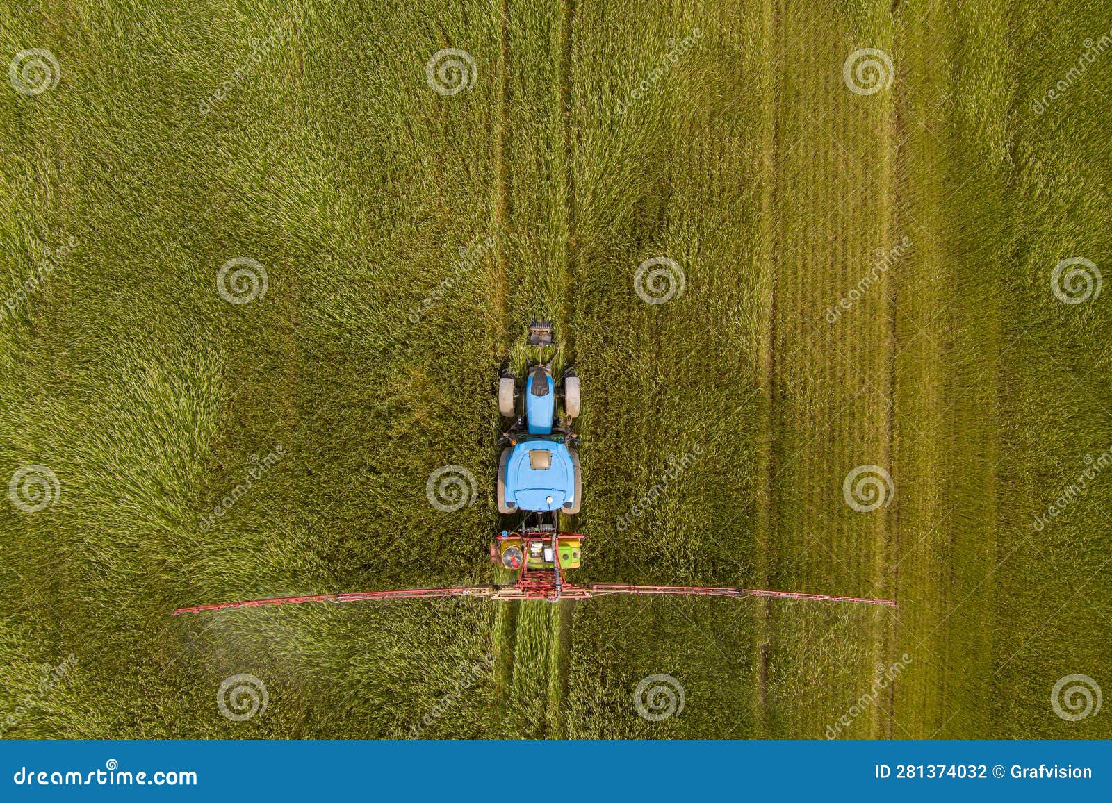 Tractor spraying field stock photo. Image of fertilizer - 281374032
