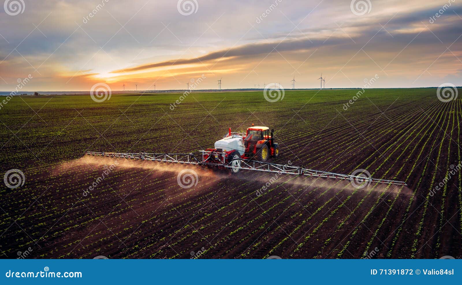 Tractor Spraying Field at Spring Stock Photo - Image of agronomy ...