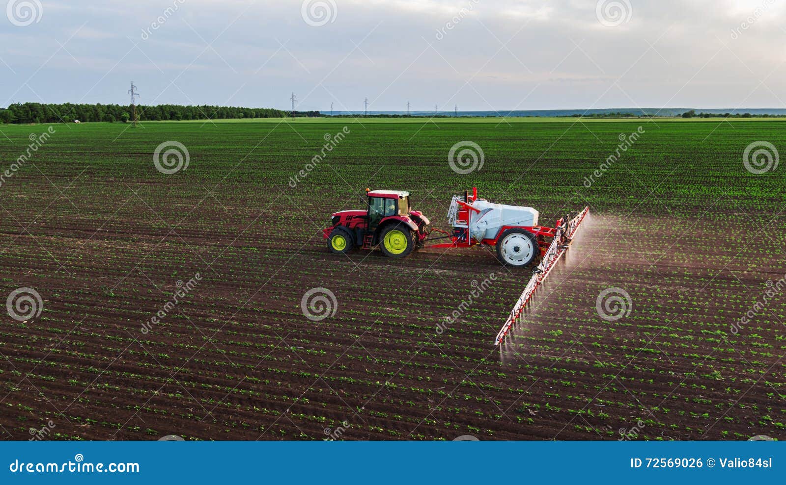 Tractor Spraying Field at Spring Stock Photo - Image of harrow, farming ...