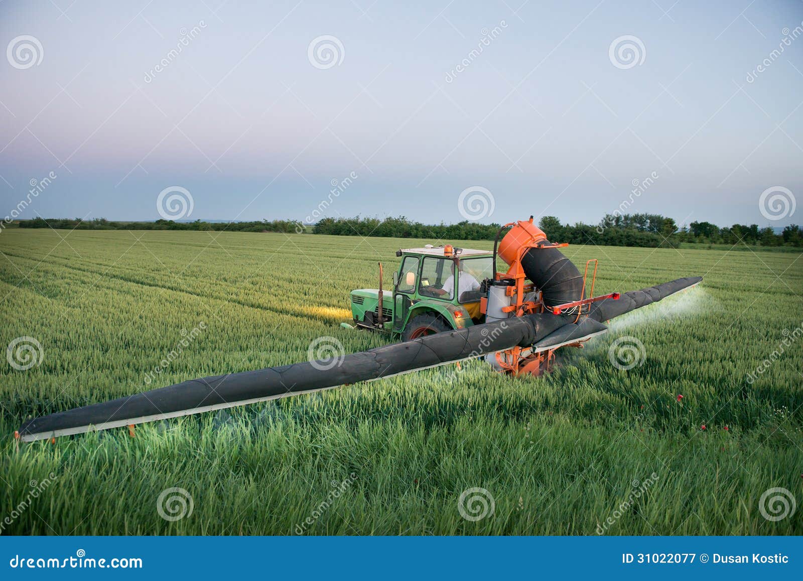Tractor Spraying on the Field Stock Image - Image of machinery ...