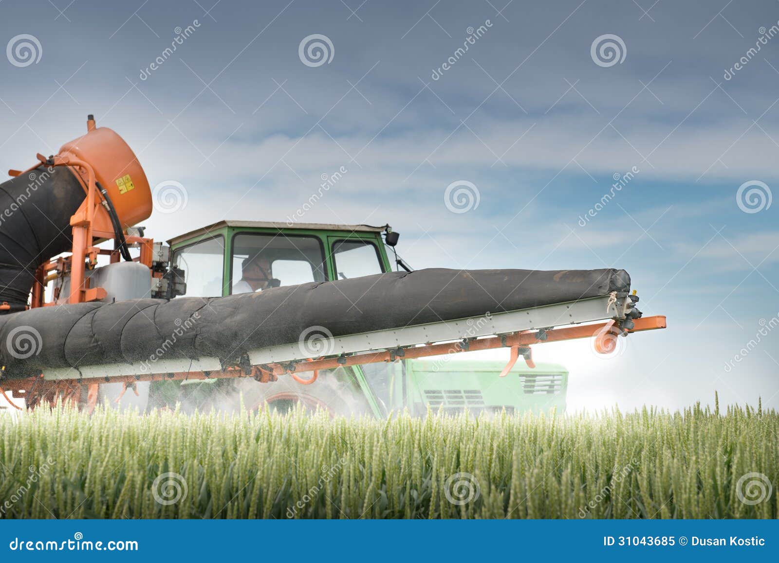 Tractor Spraying on the Field Stock Image - Image of scene, field: 31043685