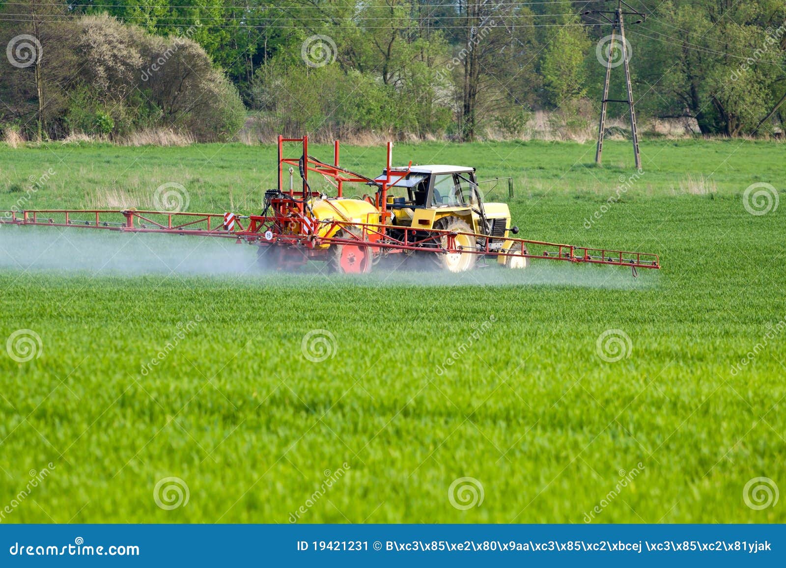Tractor Spraying Green Field Stock Image - Image of forest, working ...