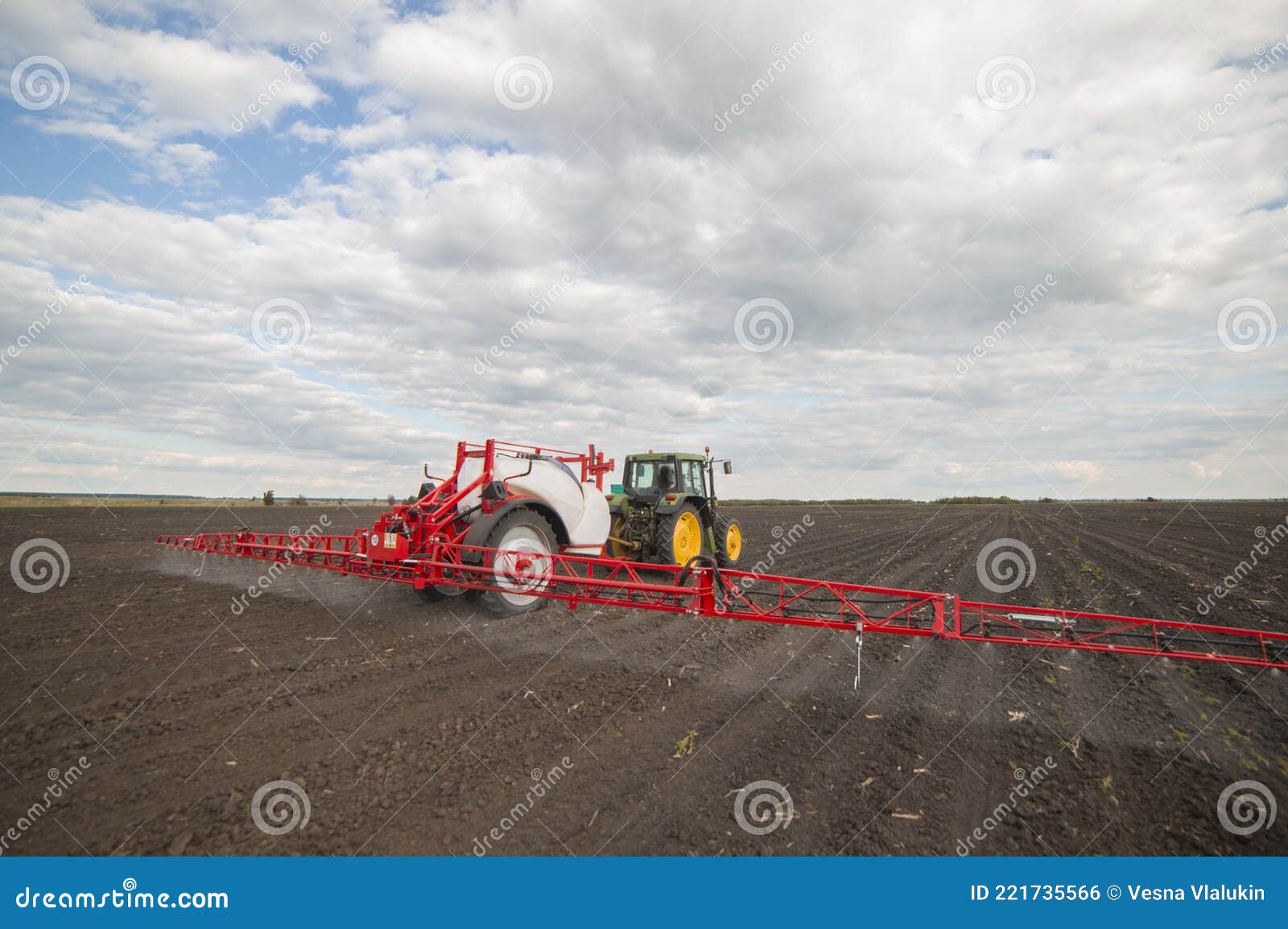 Tractor Spraying Soil in Field Editorial Photo - Image of insecticides ...