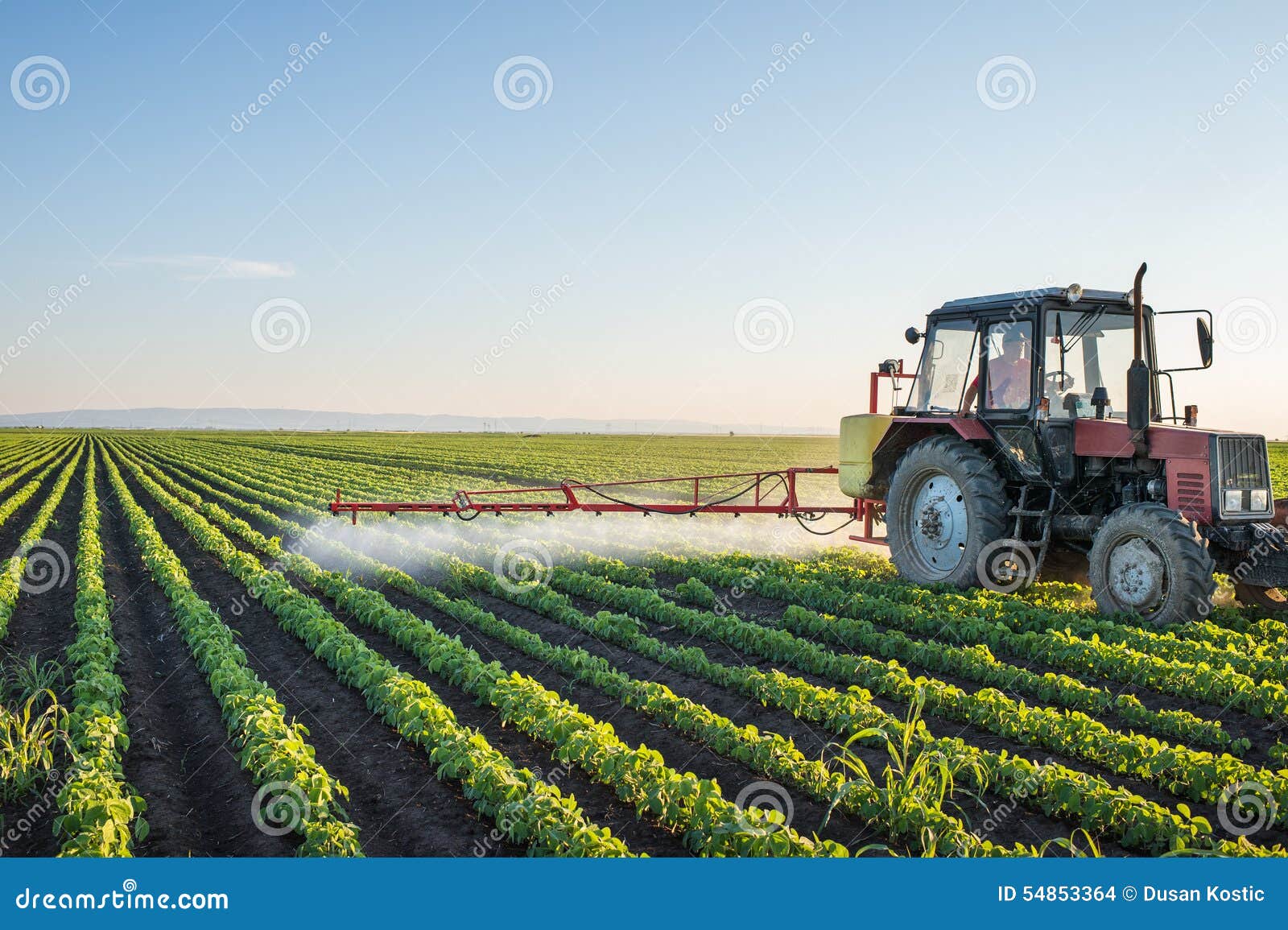 Tractor spraying stock photo. Image of spraying, scenics - 54853364