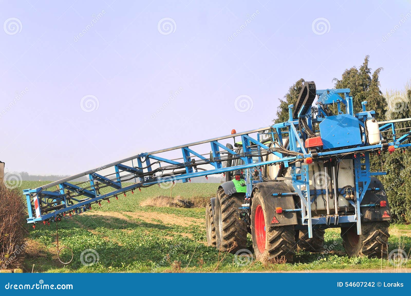 Tractor spraying. stock photo. Image of sprayer, spray - 54607242
