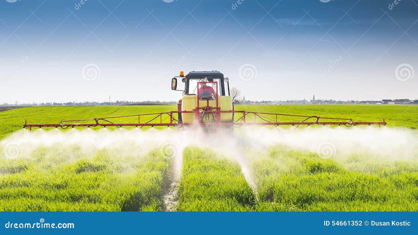 Tractor Spraying Wheat Field Stock Photo - Image of industry, season ...