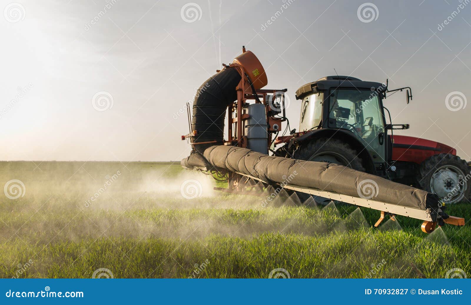 Tractor Spraying Wheat Field Stock Image - Image of drive, field: 70932827