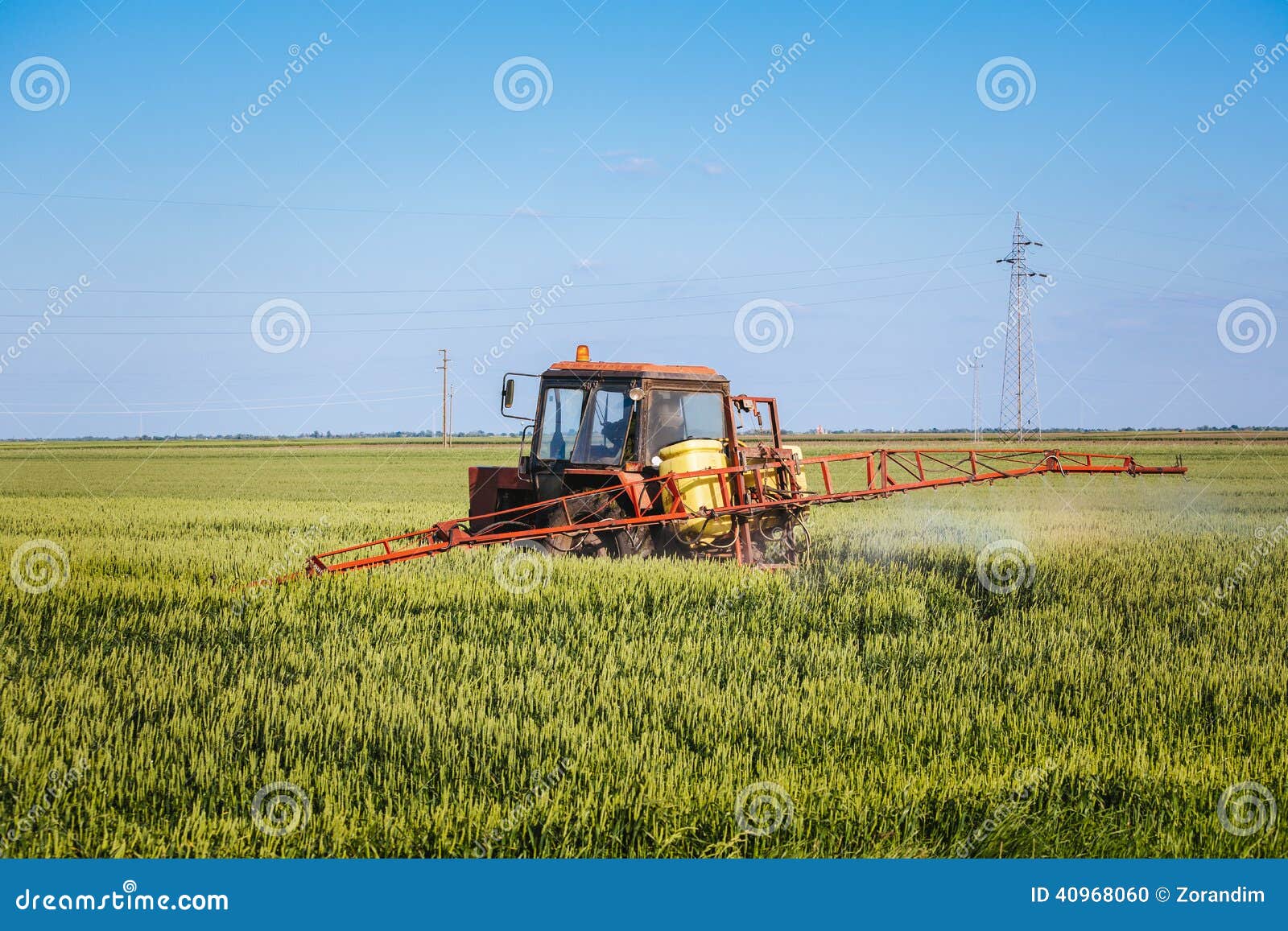 Tractor Spraying Wheat Field with Sprayer Stock Photo - Image of season ...