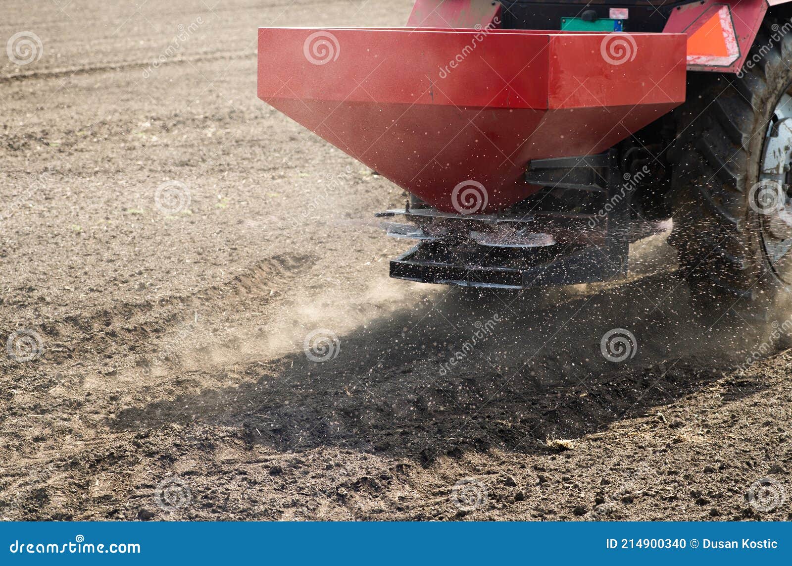 Tractor Spreading Artificial Fertilizers Stock Photo - Image of ...
