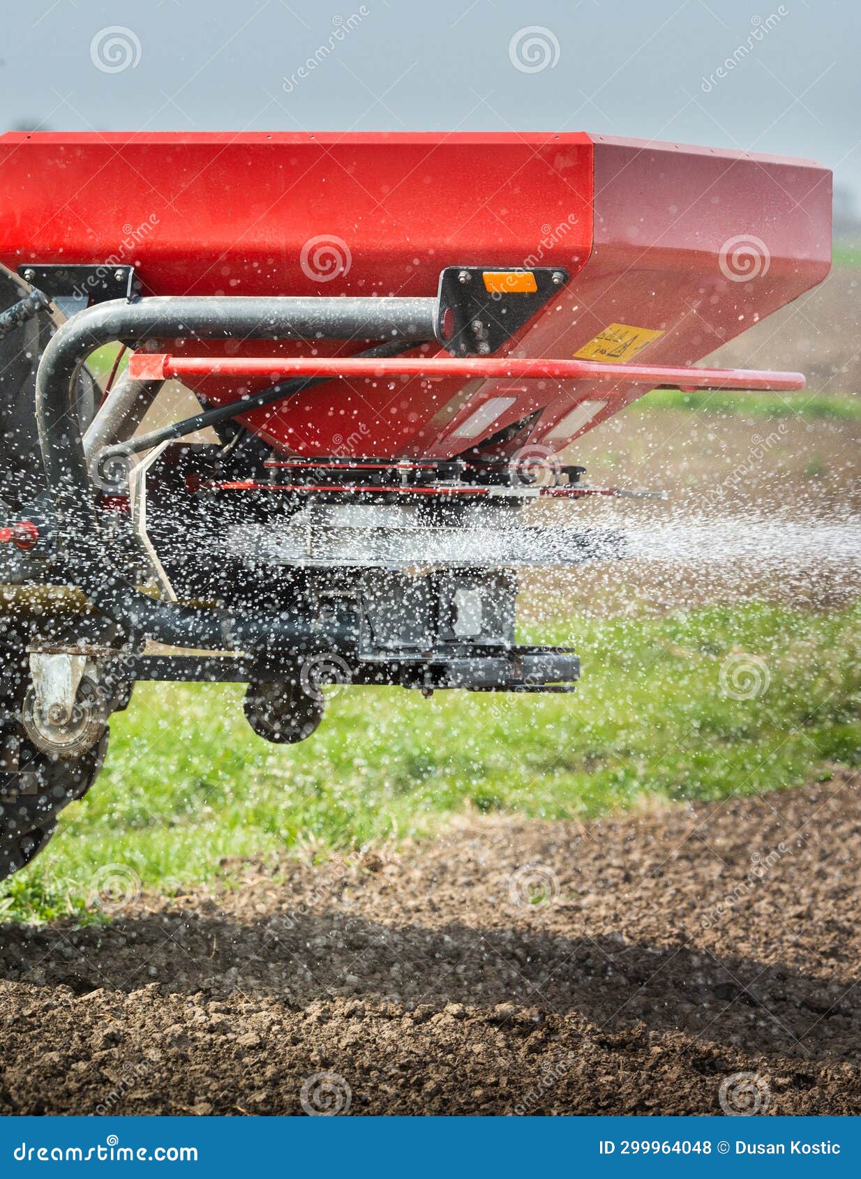 Tractor Spreading Artificial Fertilizers Stock Photo - Image of farming ...