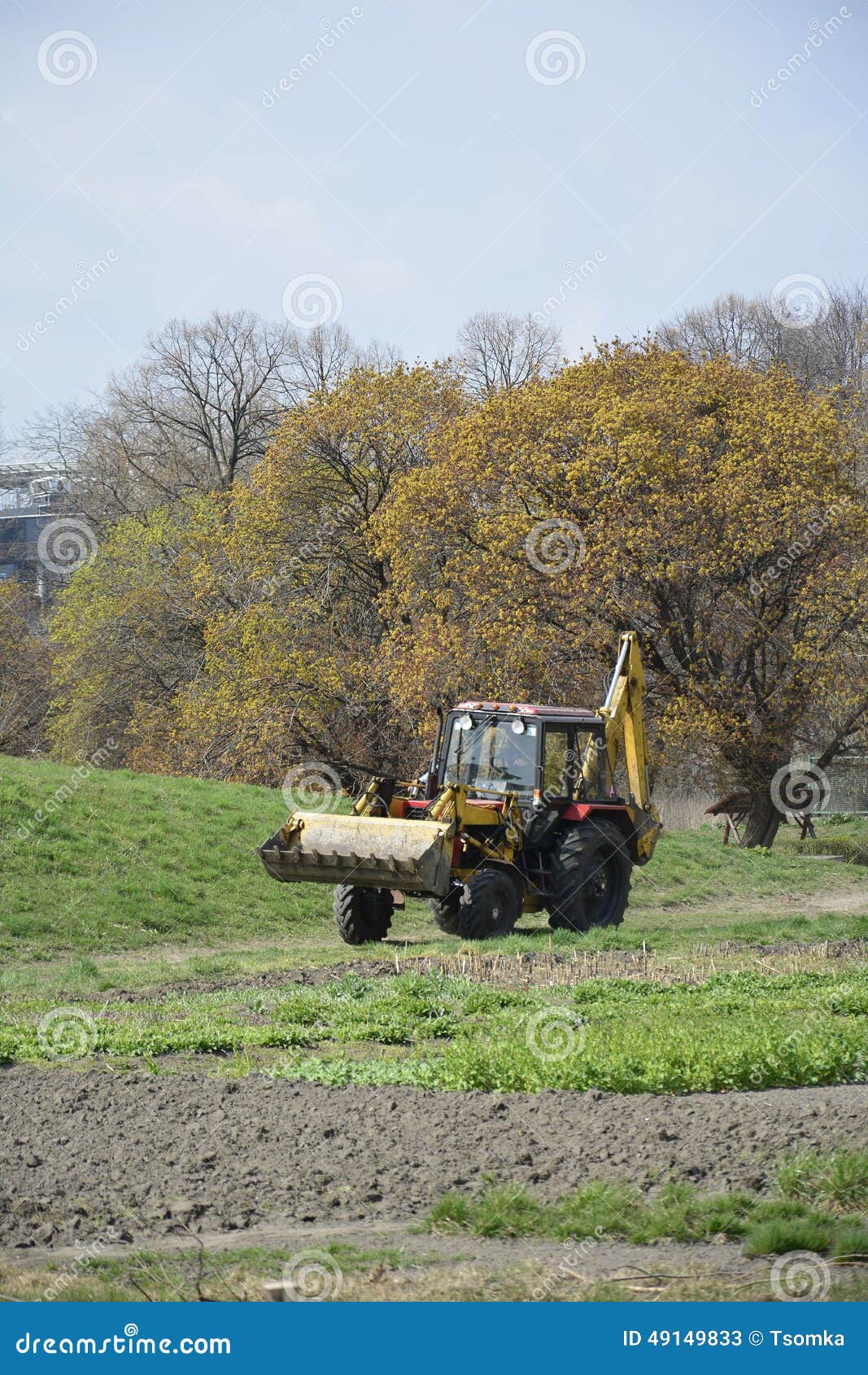 Tractor Spring on the Field. Stock Image - Image of tree, nature: 49149833