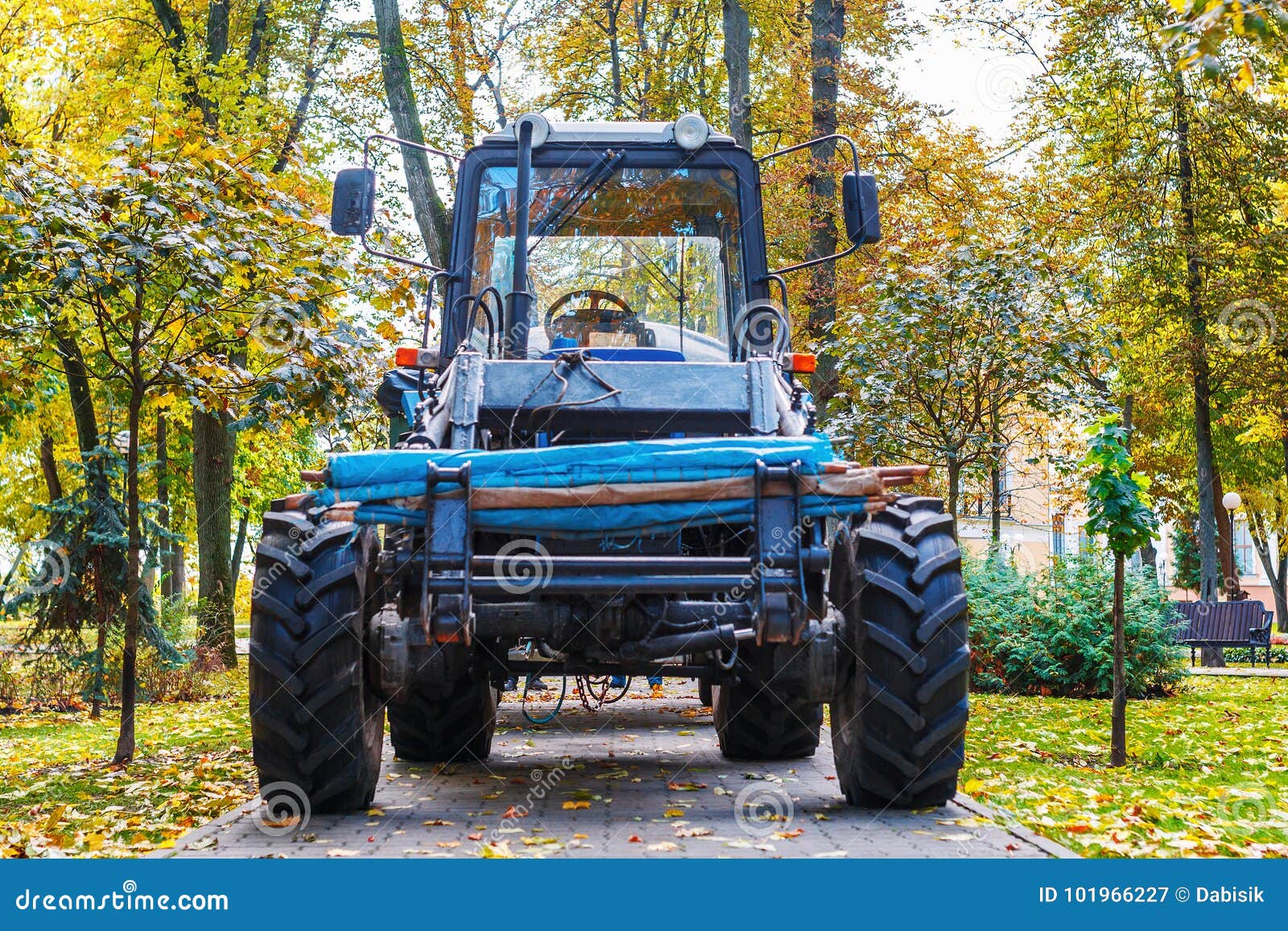 A Tractor Standing in Front of the Nature Stock Image - Image of ...