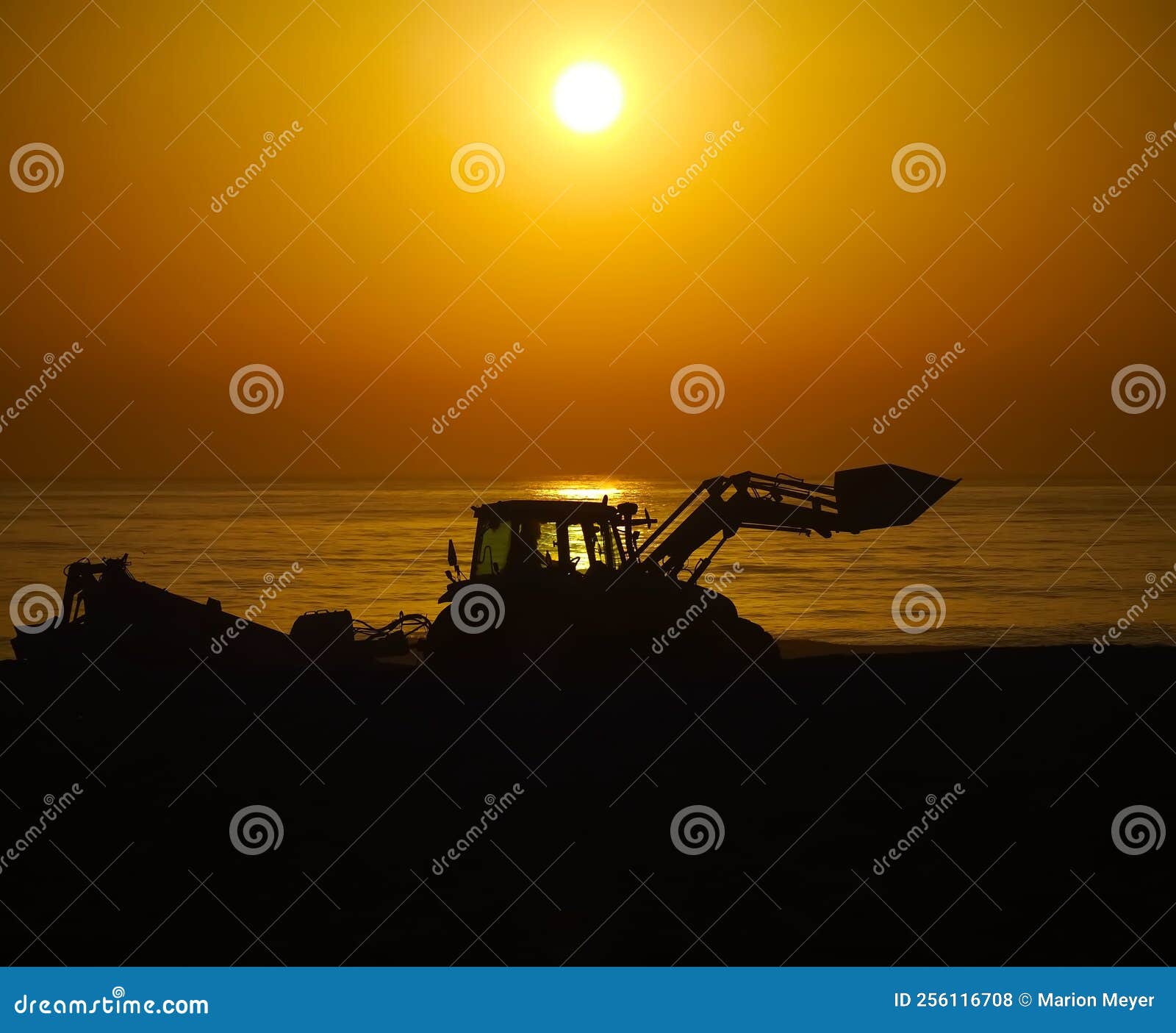 A Tractor at Sunset, Symbolizing Energy and the Sun Stock Photo - Image ...