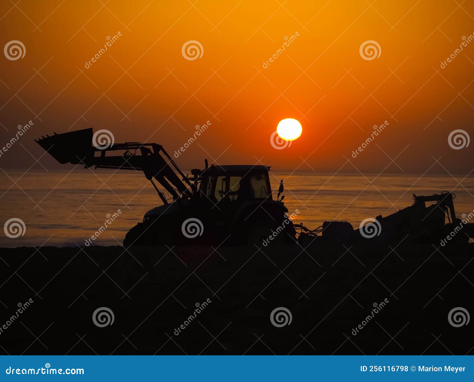 A Tractor at Sunset, Symbolizing Energy and the Sun Stock Photo - Image ...