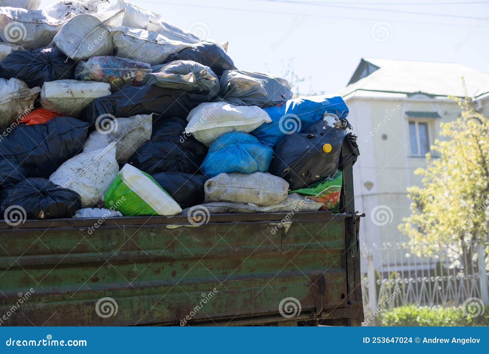 Tractor Trailer Filled with Garbage Bags. Stock Photo - Image of poor ...