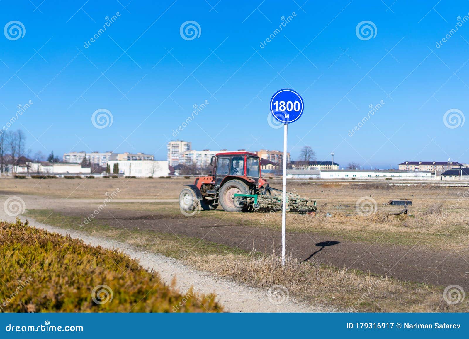 Tractor with a Trailer Plows a Field Editorial Photography - Image of ...