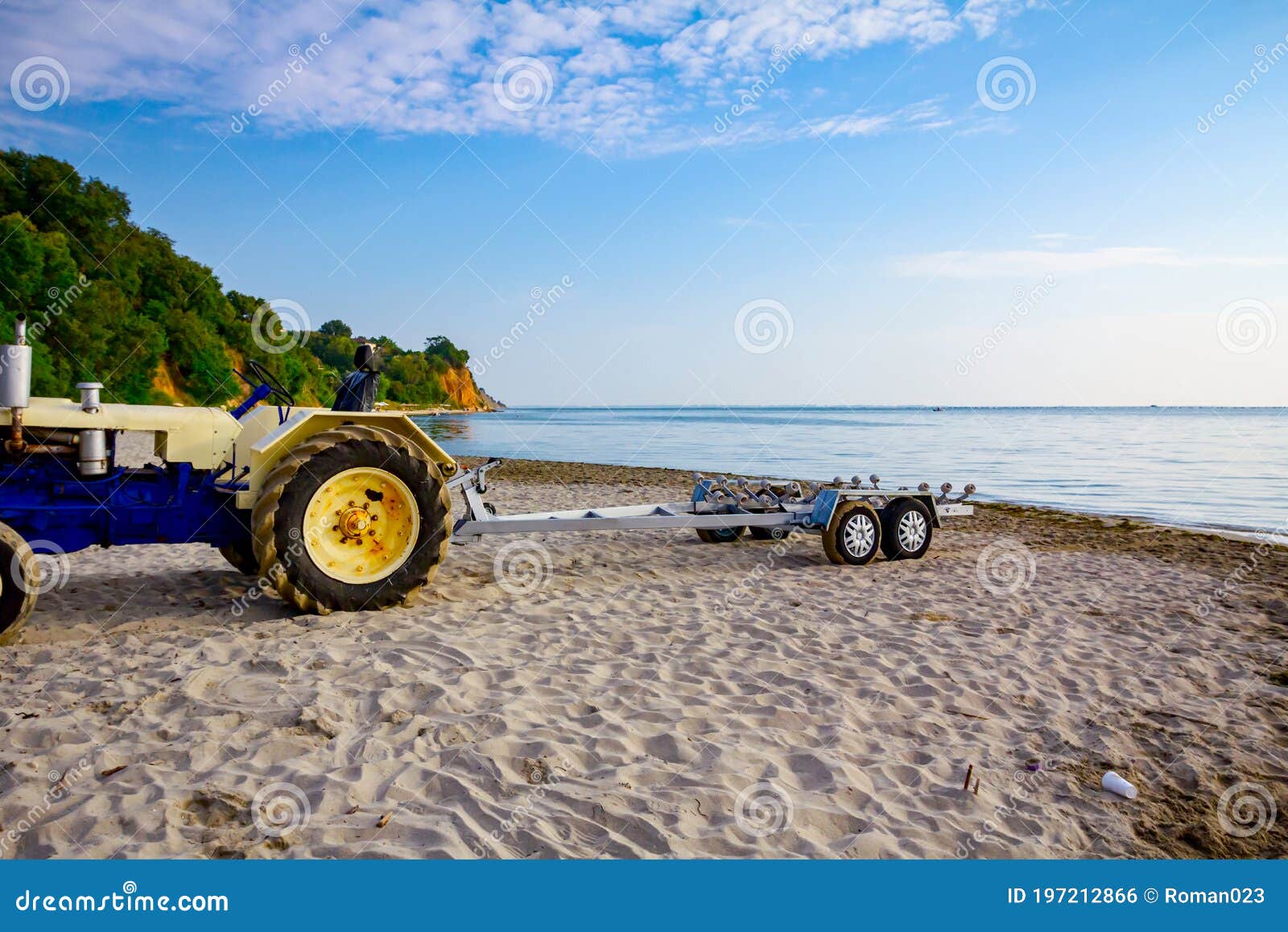 Tractor with Trailer for Transport Boats on the Sandy Beach Stock Photo ...