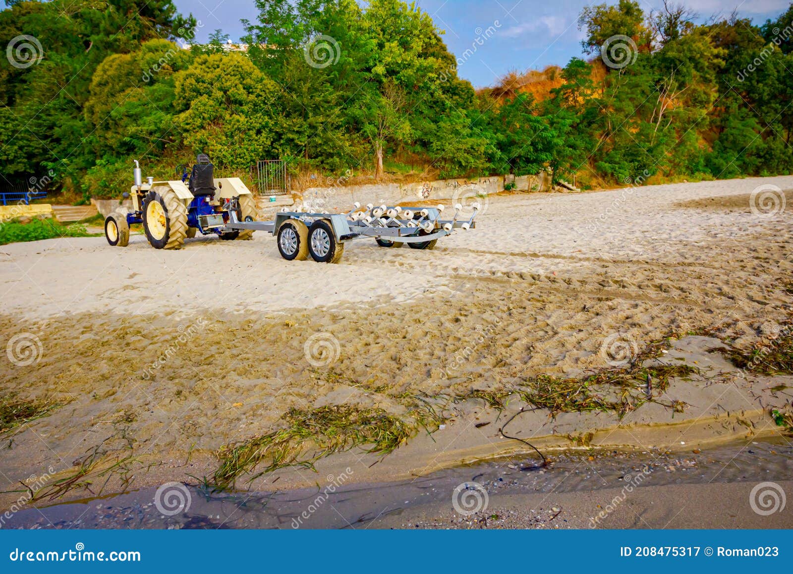 Tractor with Trailer for Transport Boats on the Sandy Beach Editorial ...