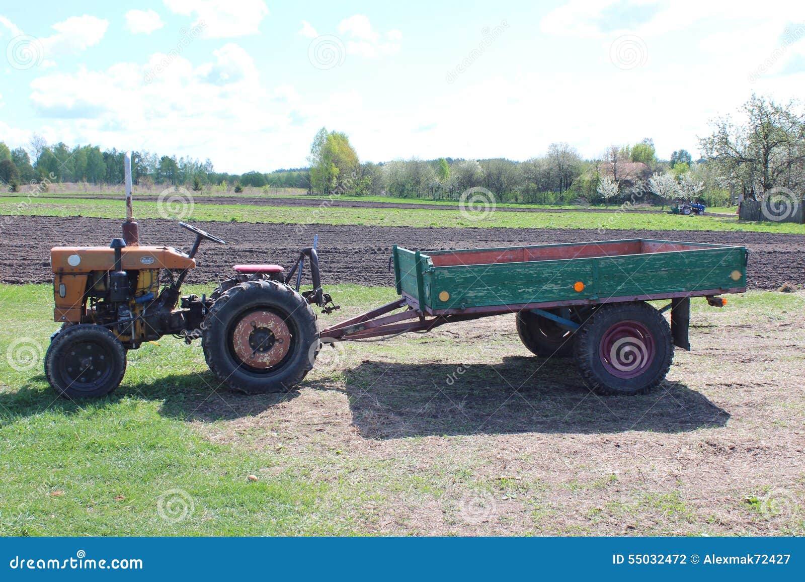 Tractor with Trailer in the Village Stock Photo - Image of countryside ...