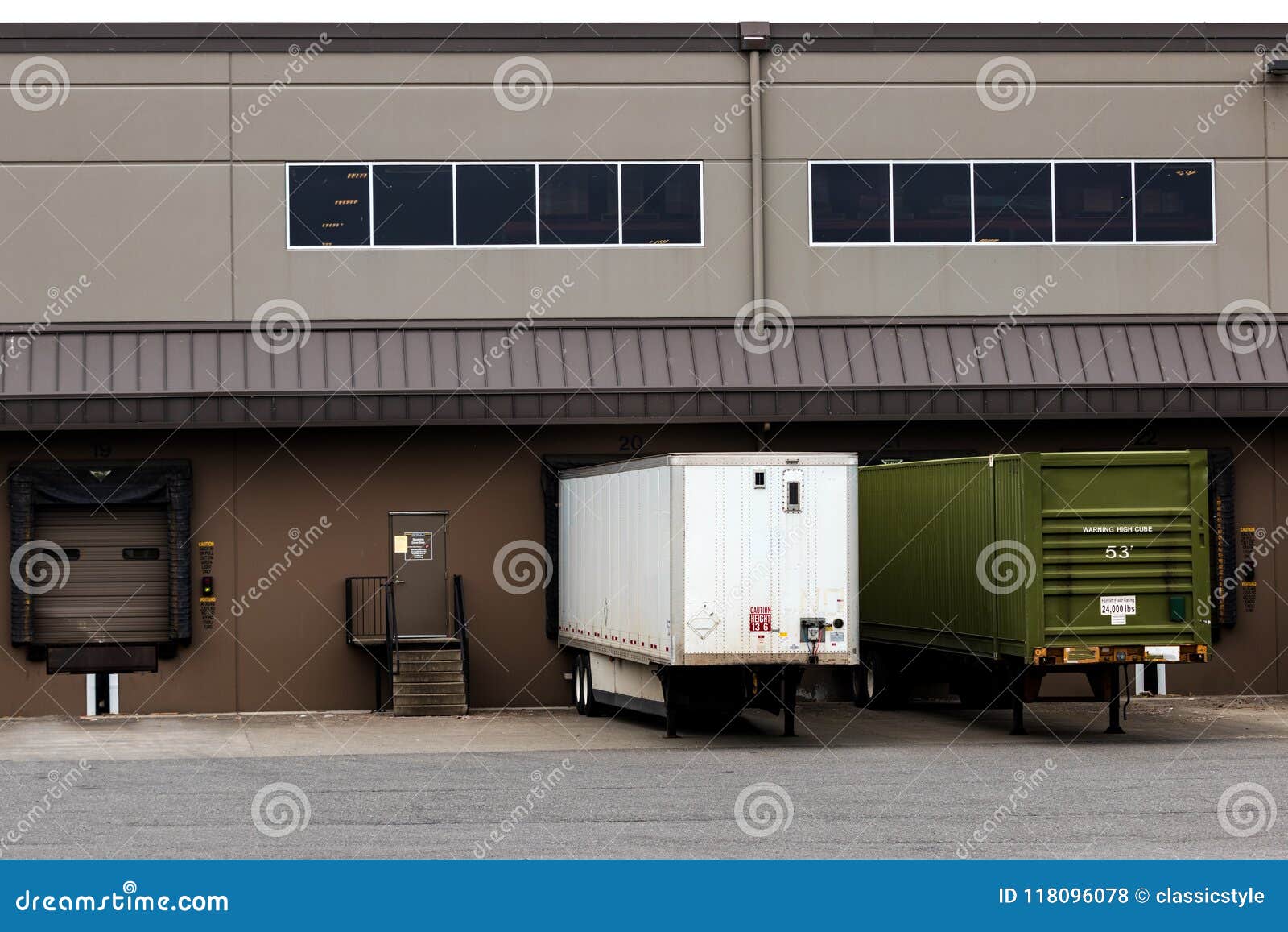 Tractor Trailers at a Warehouse Cargo Dock Stock Photo - Image of door ...