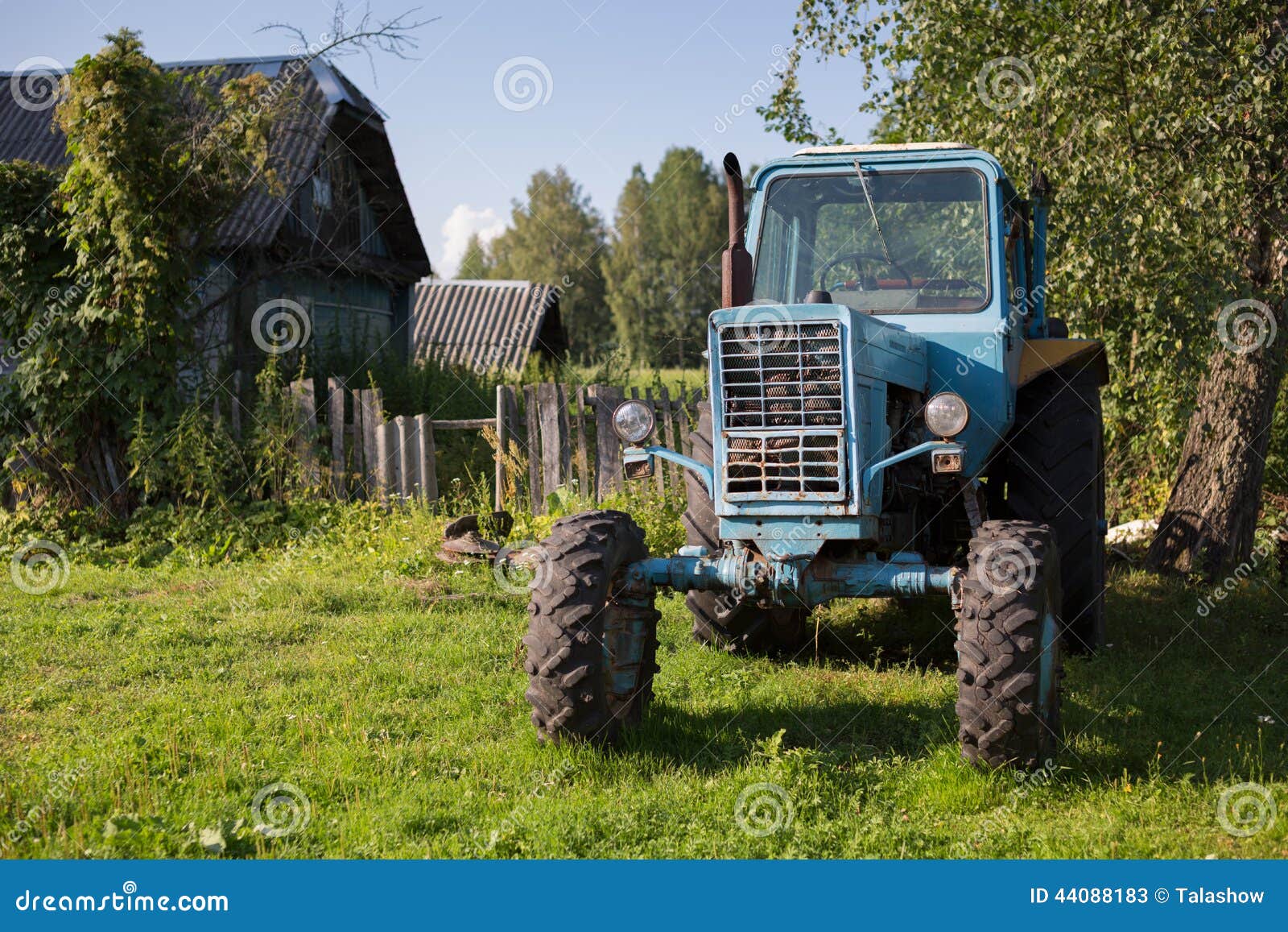 Tractor in the village stock image. Image of house, machinery - 44088183