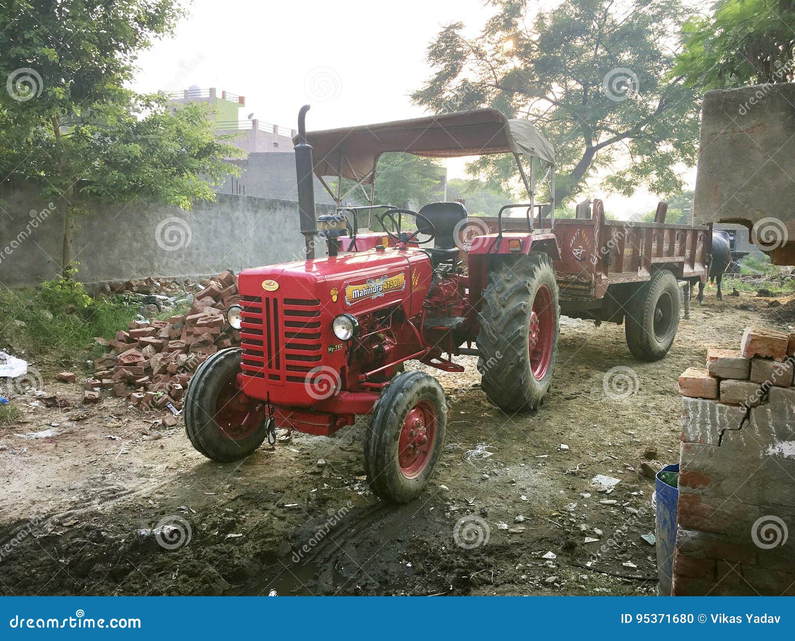 Tractor in village editorial image. Image of standing - 95371680