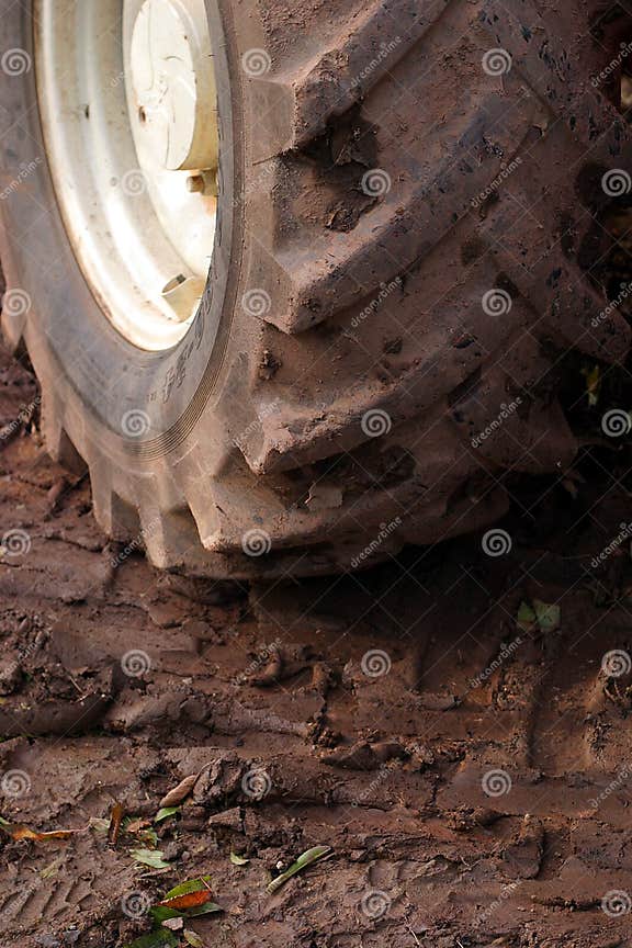 Tractor wheel stock image. Image of treads, building, muddy - 35249