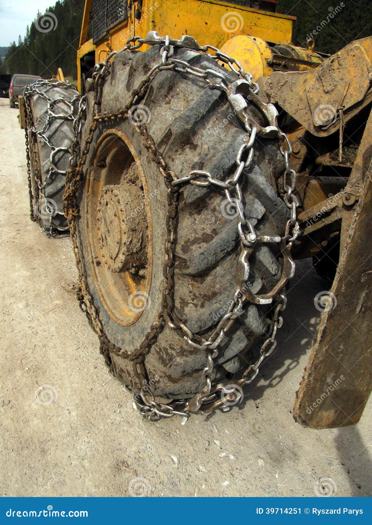 Tractor wheel with chain stock image. Image of forest - 39714251