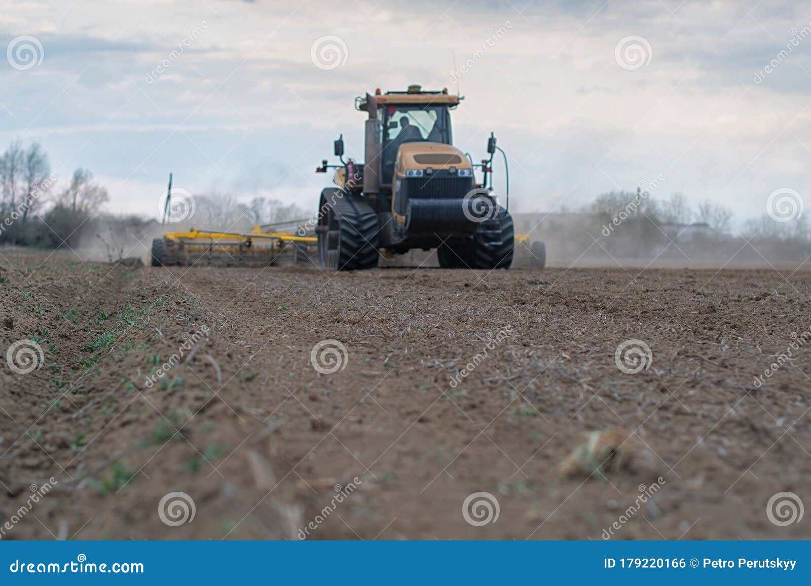 Tractor working stock photo. Image of industry, plow - 179220166