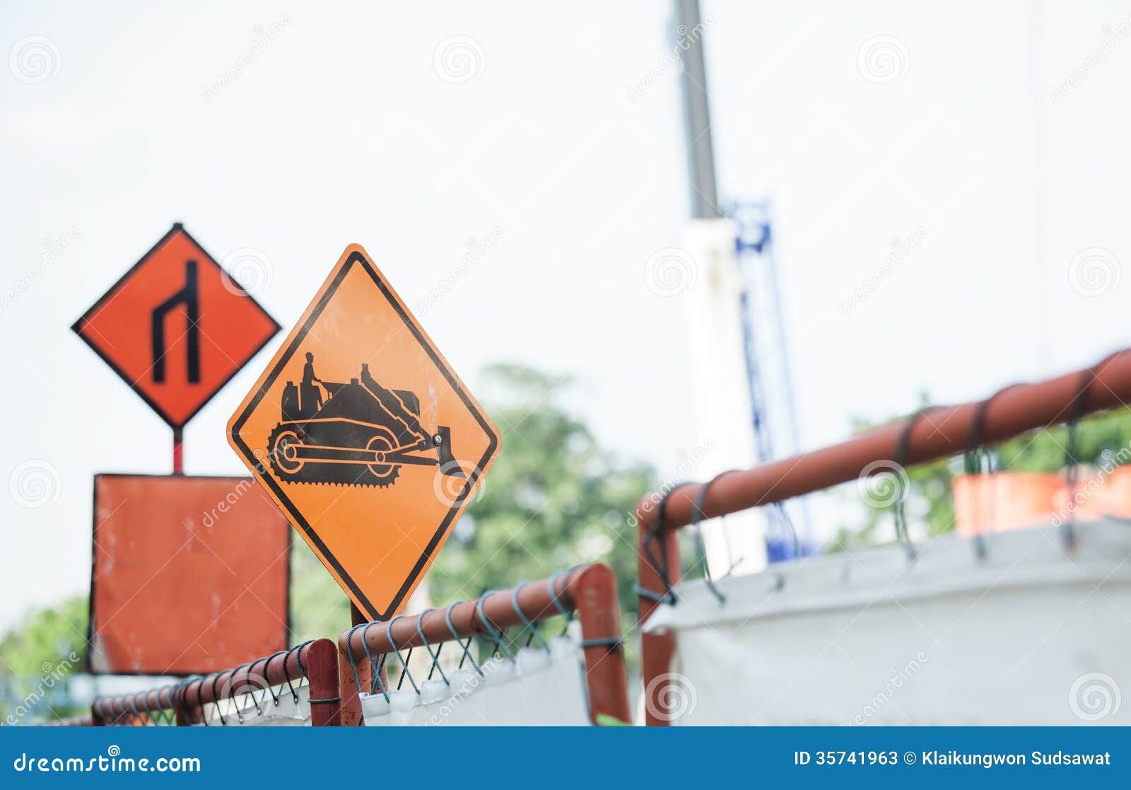 Tractor working sign stock image. Image of mind, orange - 35741963