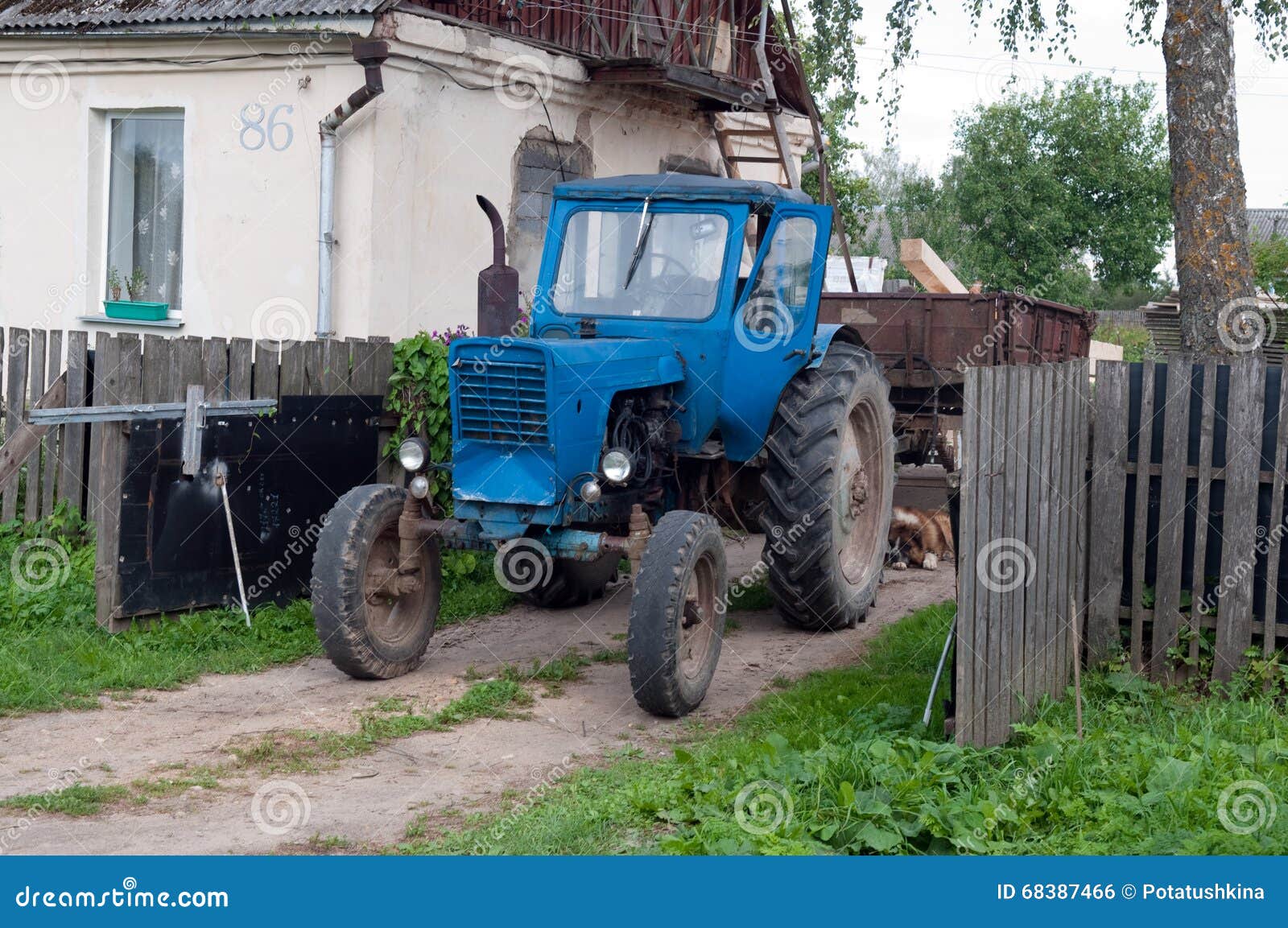 Tractor in the Yard of the Rural House Editorial Photo - Image of home ...