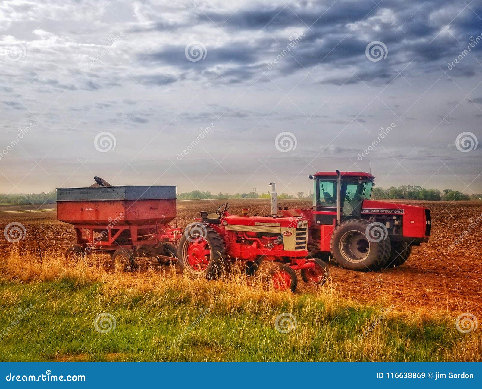 Tractors at harvest editorial stock image. Image of view - 116638869