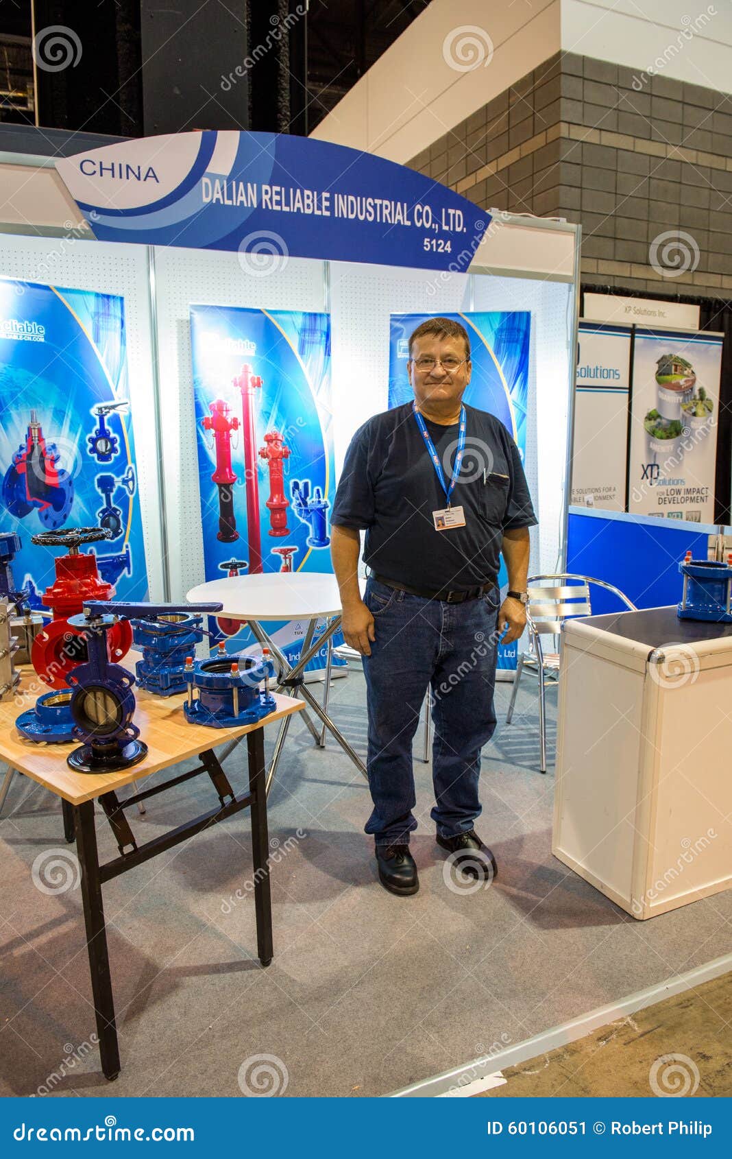 Man Standing at a Trade Show Booth Editorial Photo - Image of booth ...