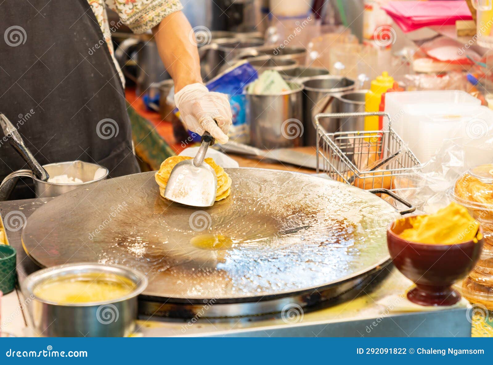 Trader fried roti on pan stock photo. Image of cream - 292091822