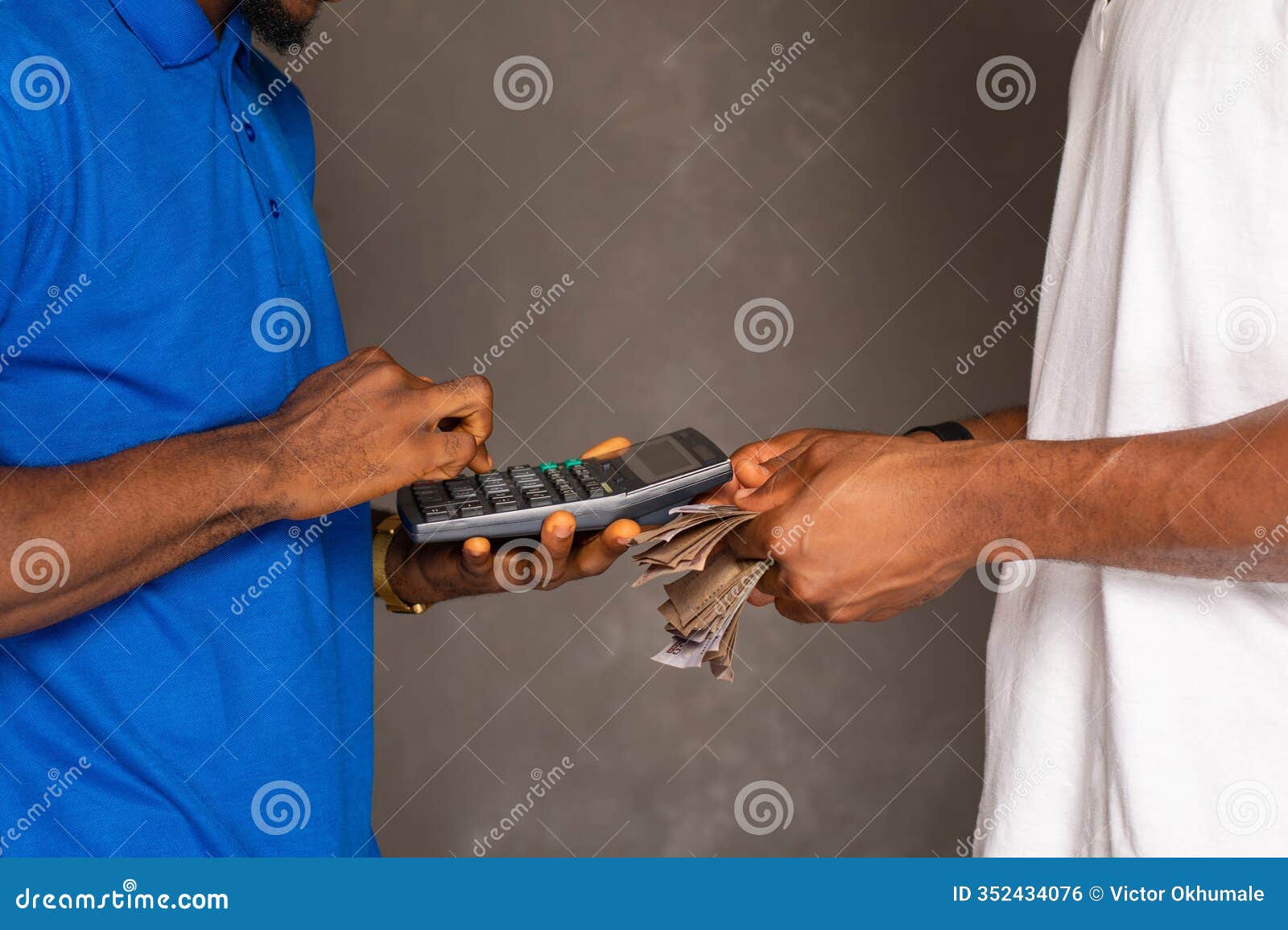 Trader Using a Calculator and a Customer Counting Money To Make Payment ...