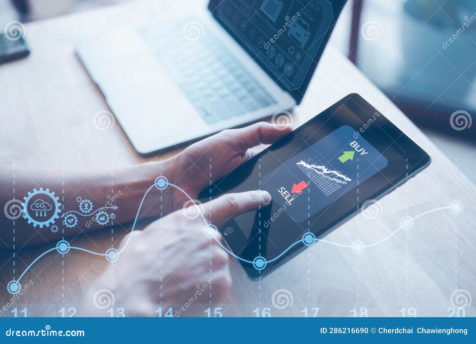 Trader Using Smartphone and Computer Laptop To Trade Carbon Credit on ...