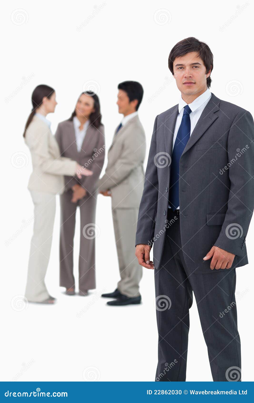 Tradesman with Colleagues Behind Him Stock Photo - Image of standing ...
