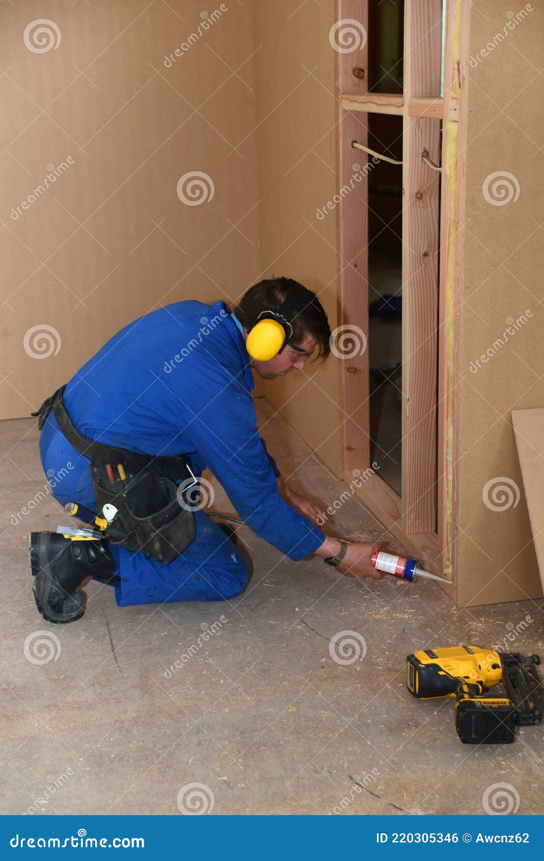 Tradesman Placing Wall Boards Stock Photo - Image of glueing, organized ...
